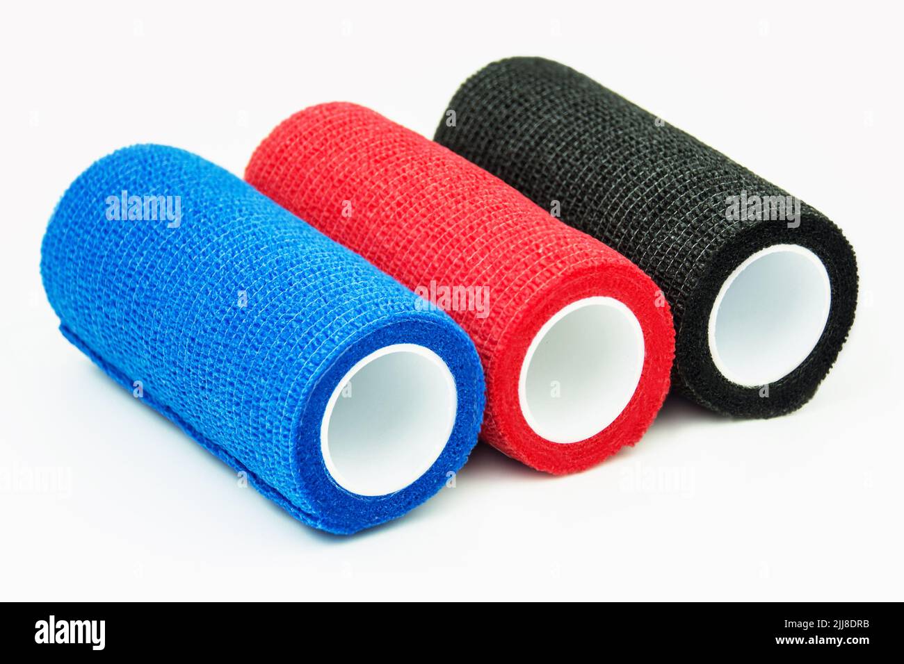3 colorful various elastic bandages on white background Stock Photo - Alamy