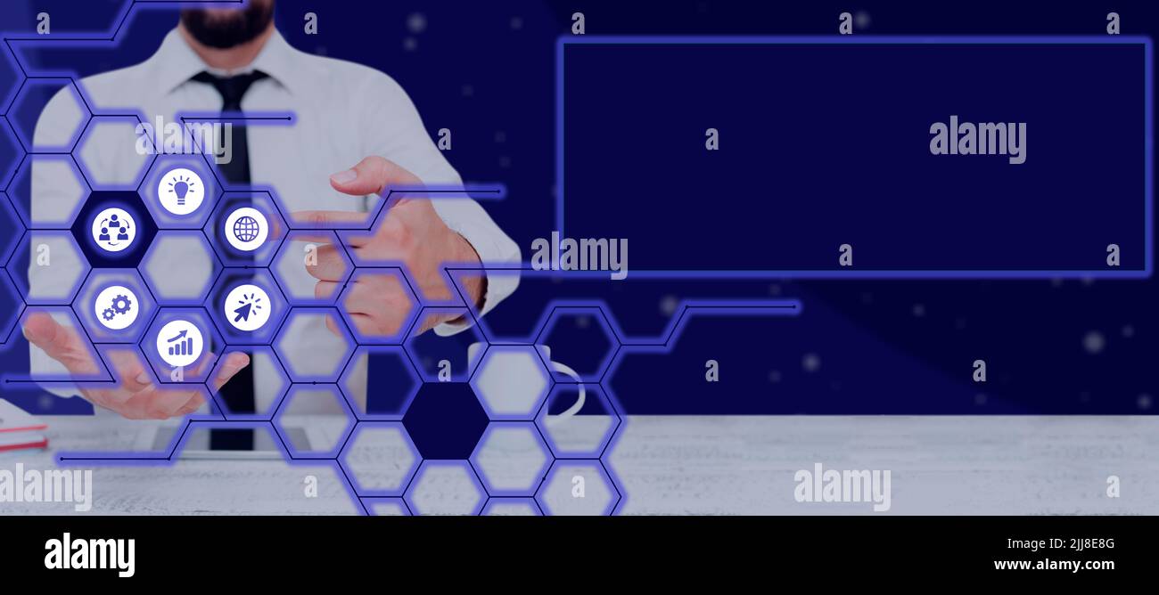 Businessman With A Touch Screen Displaying Digital Symbols In A Glowing Hexagon Pattern. Man In ...