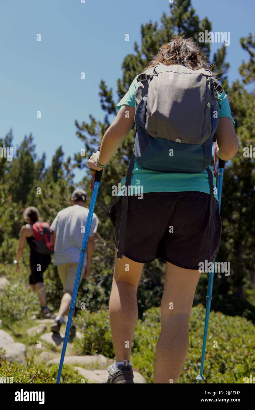 People hiking in the mountains Stock Photo - Alamy