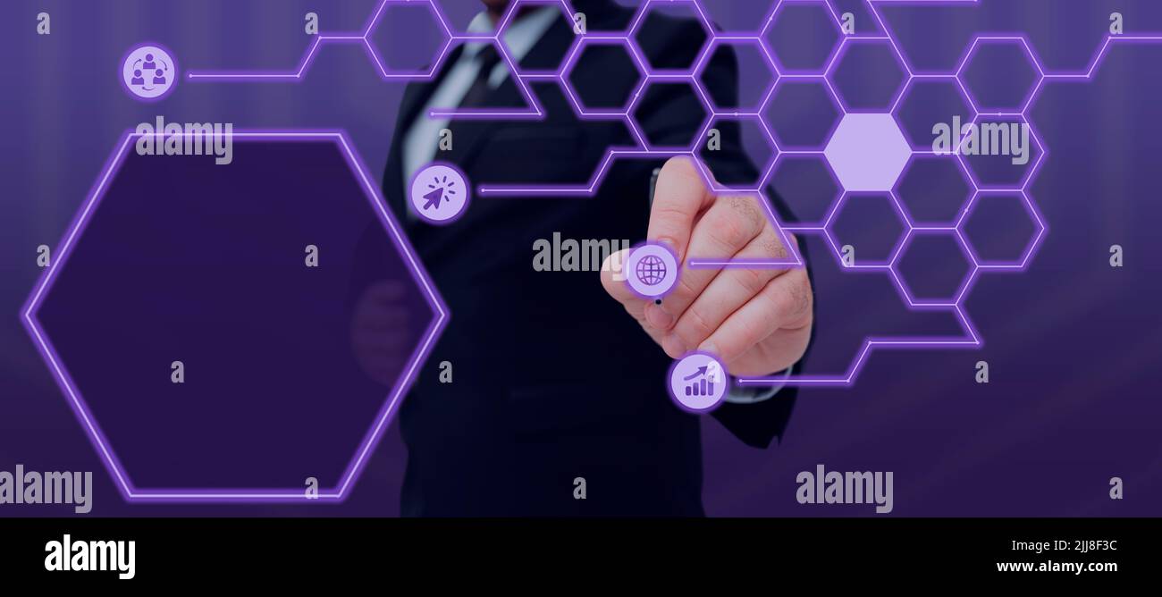 Businessman With A Pen And Pointing On Digital Symbols In A Glowing Hexagon Pattern. Man In A ...