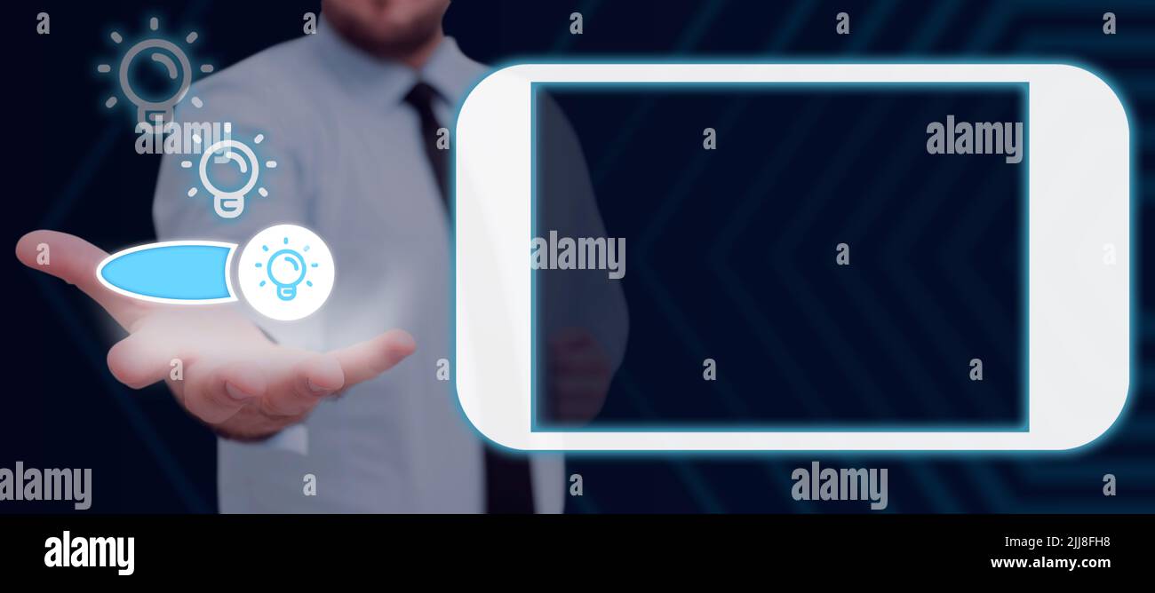 Businessman Extending Hand On Multiple Glowing Light Bulb Symbols With A Blank Touch Screen ...
