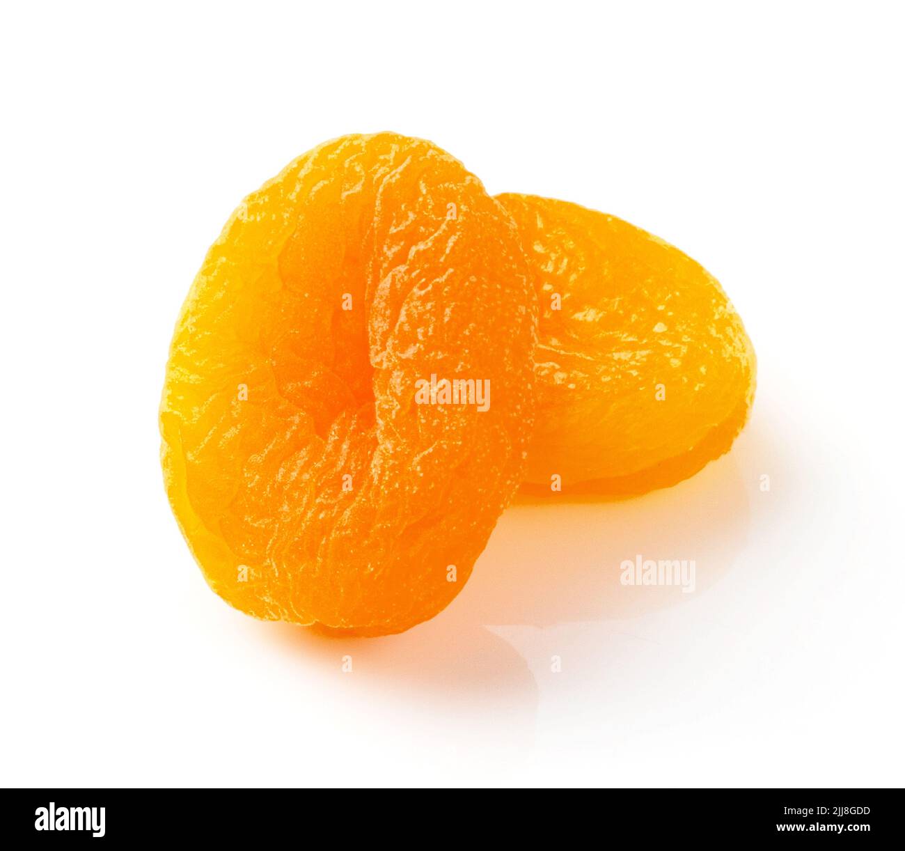 Two dried apricots isolated on white background Stock Photo - Alamy