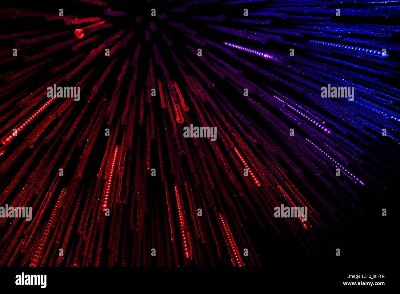 A psychedelic ceiling with blue and red lights in the disco Stock Photo ...