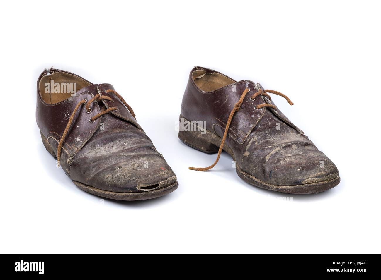 Old dirty shabby shoes on a white background Stock Photo - Alamy