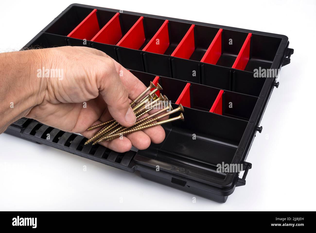 Screw organizer box on a white background Stock Photo - Alamy