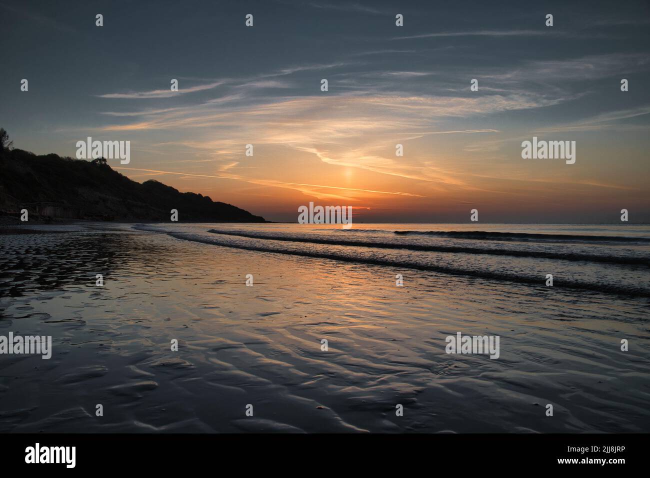 An aesthetic view of calm sea waves in a beach in the Isle of Wight ...