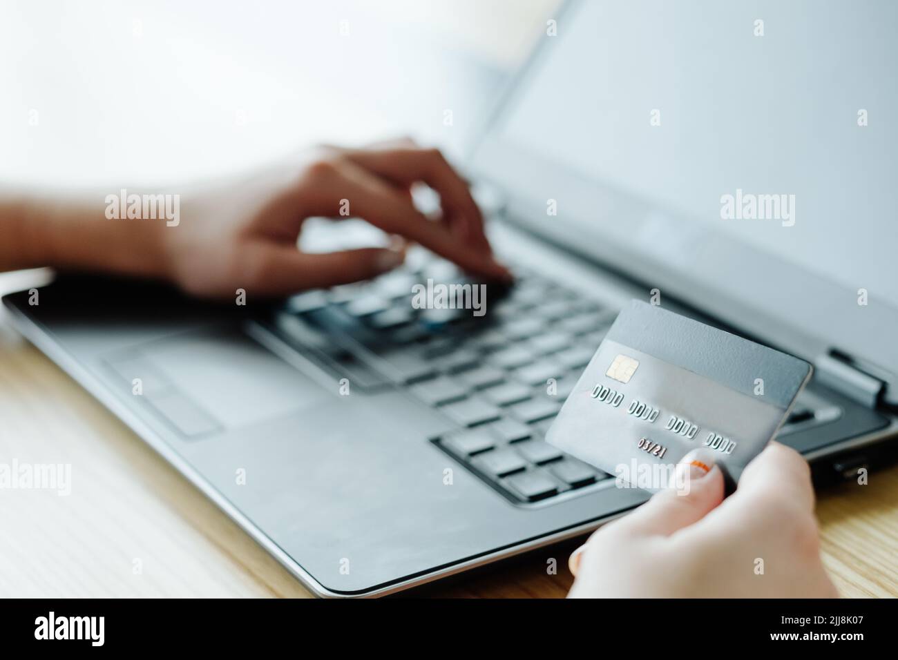 online money loan woman typing credit card laptop Stock Photo - Alamy