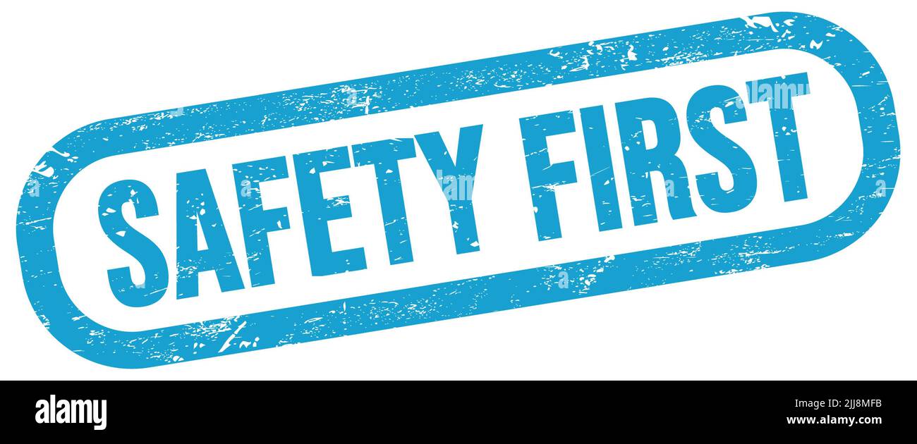 SAFETY FIRST, text on blue rectangle stamp sign Stock Photo - Alamy