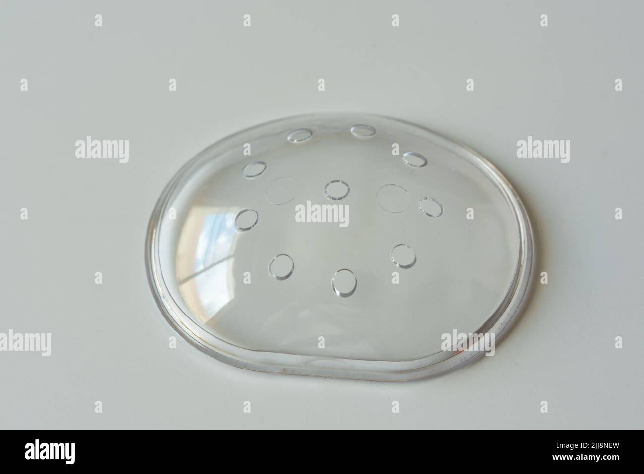 A clear plastic protective eye shield on white background Stock Photo ...