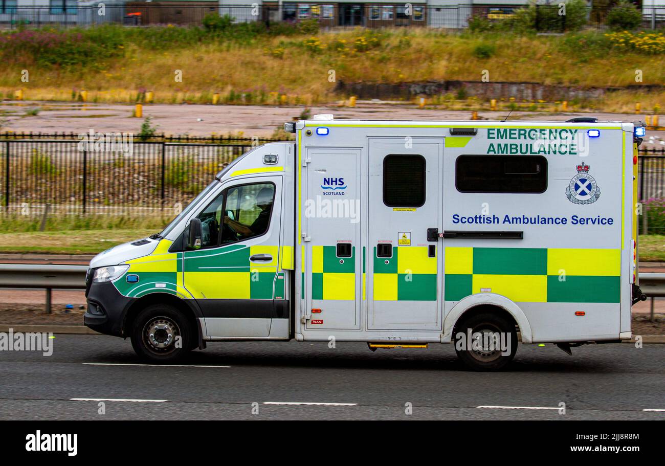 NHS Scottish Ambulance Service emergency ambulance responding to an emergency 999 call along on ...
