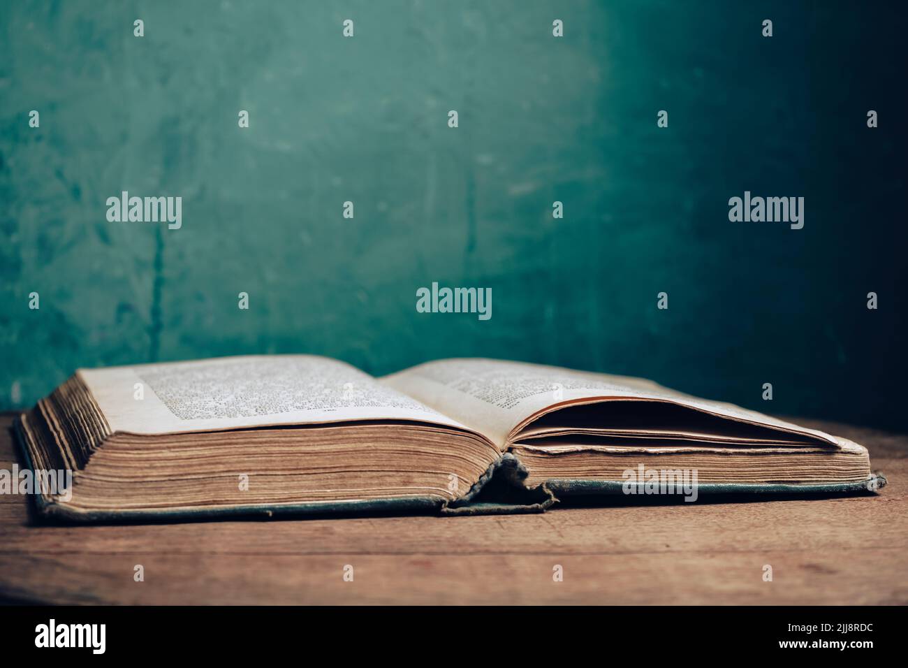 Open vintage ancient book. Pattern background for design. The book on a ...