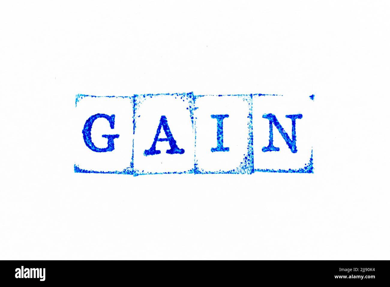 Blue color ink rubber stamp in word gain on white paper background ...