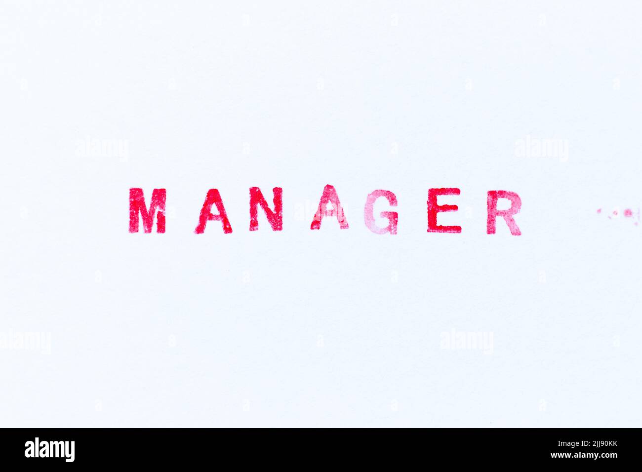 Red color ink rubber stamp in word manager on white paper background ...