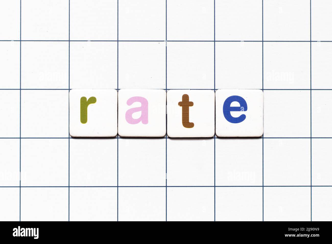 Colorful tile letter in word rate on white grid background Stock Photo ...