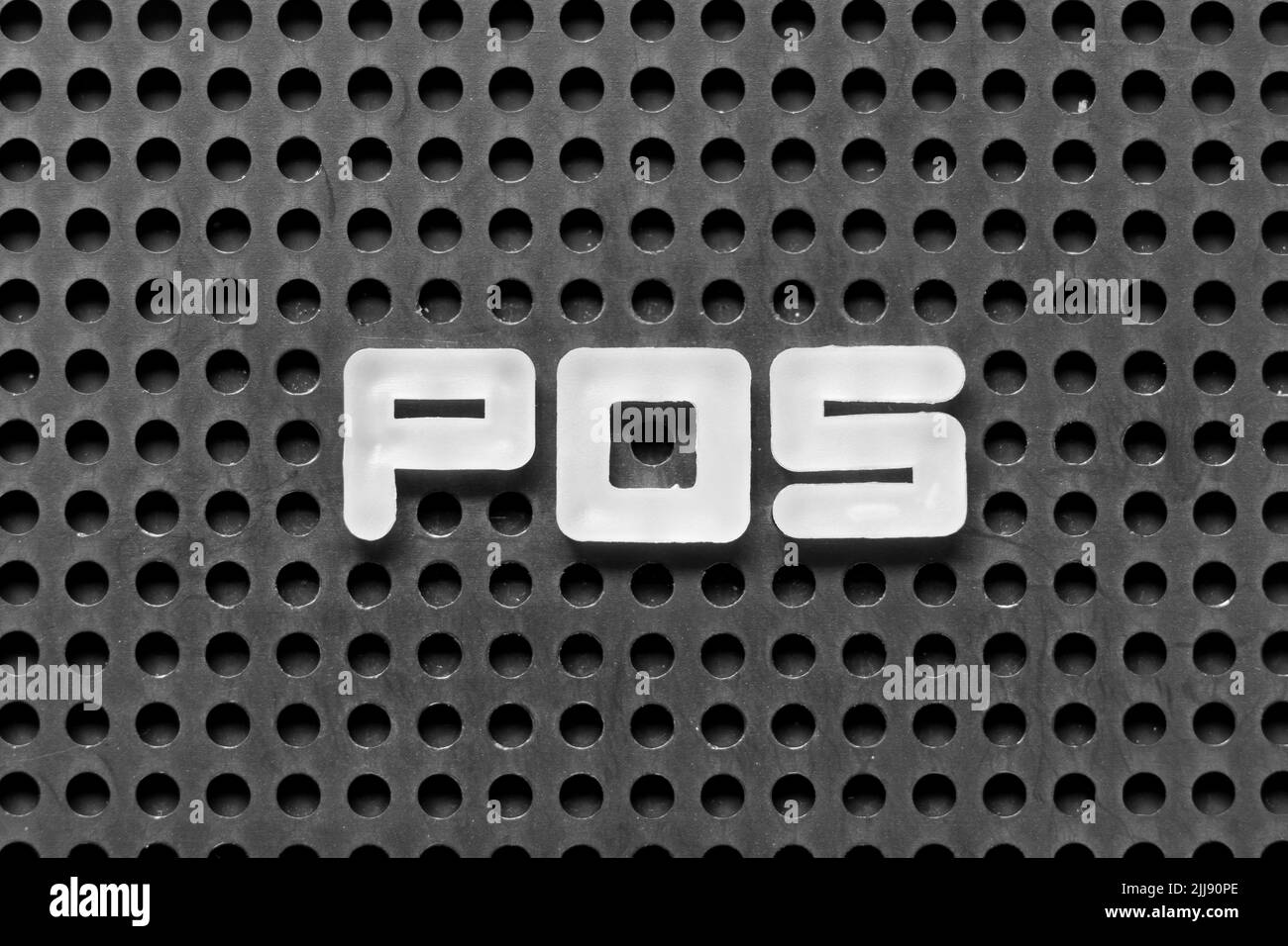 White alphabet letter in word POS (abbreviation of point of sale) on ...