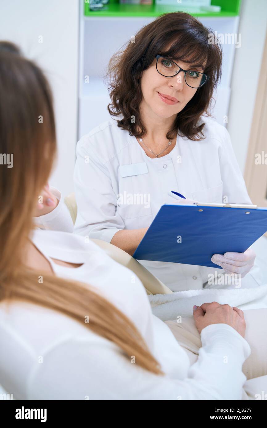 Woman dermatologist examination hi-res stock photography and images - Alamy