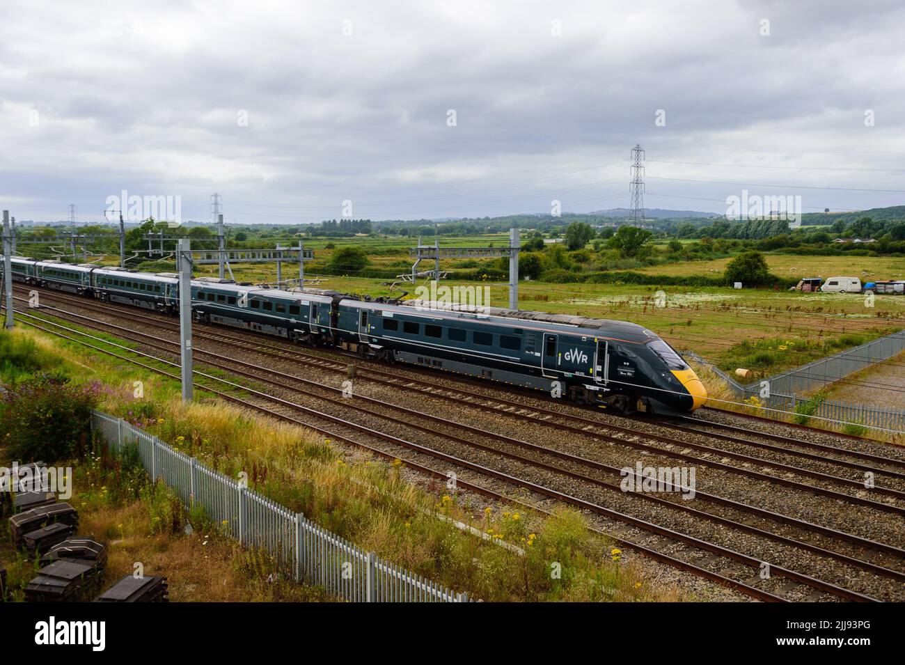24.07.22 - A GWR inter city train travels on the main line between ...