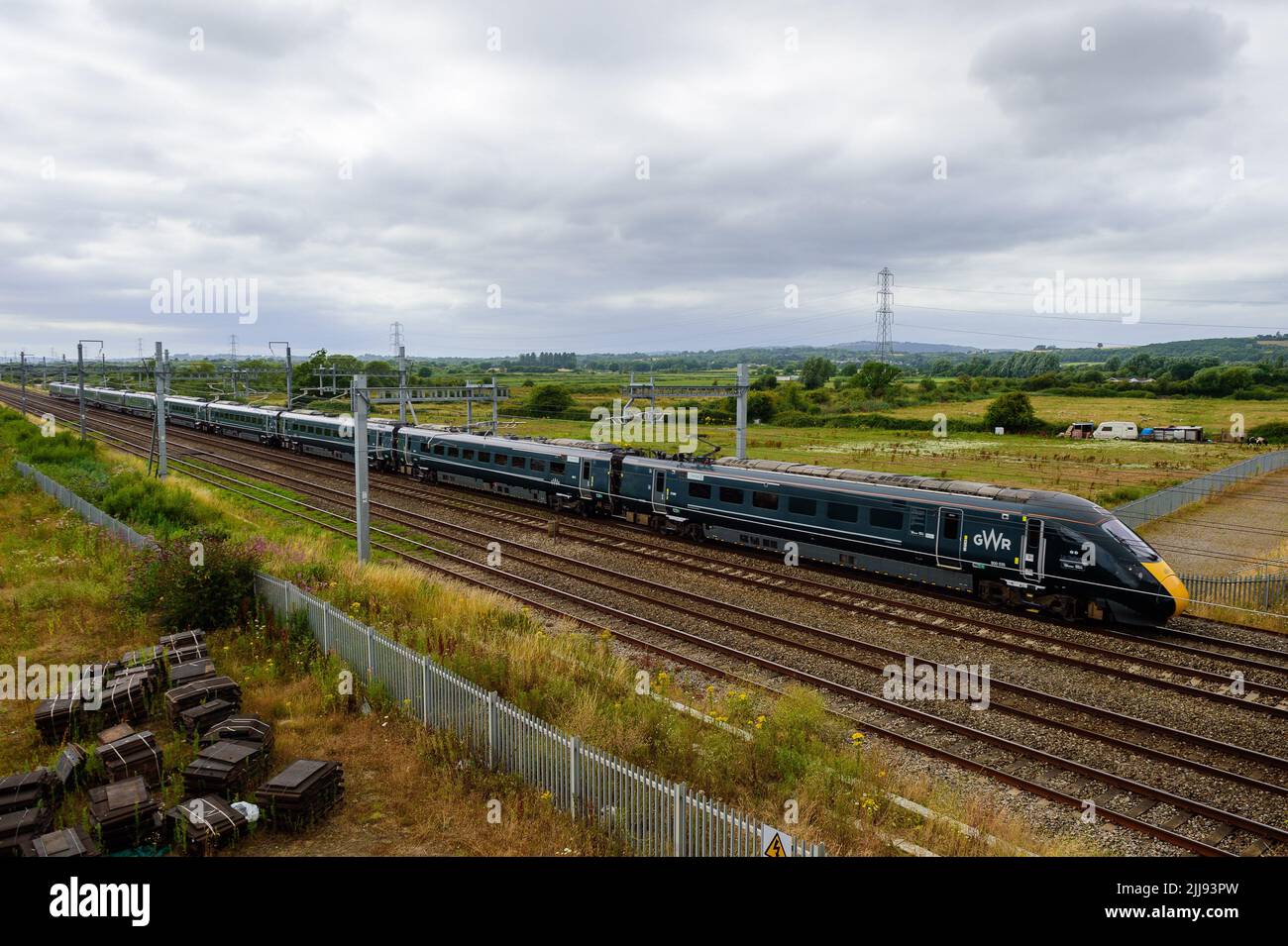 24.07.22 - A GWR inter city train travels on the main line between ...