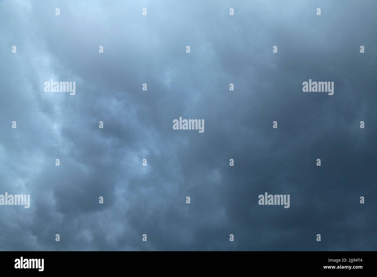 Atmosphere and formation of rain. Low hanging clouds with rain on the ...