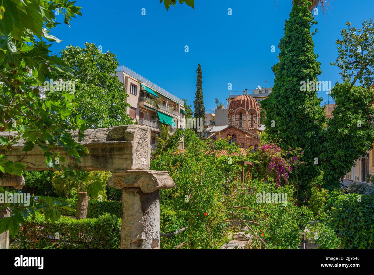 Street view in Plaka district of Athens at the Holy Church of Saint ...