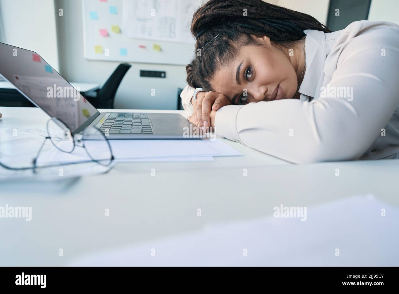 Modern corporate employee suffering from job burnout Stock Photo - Alamy