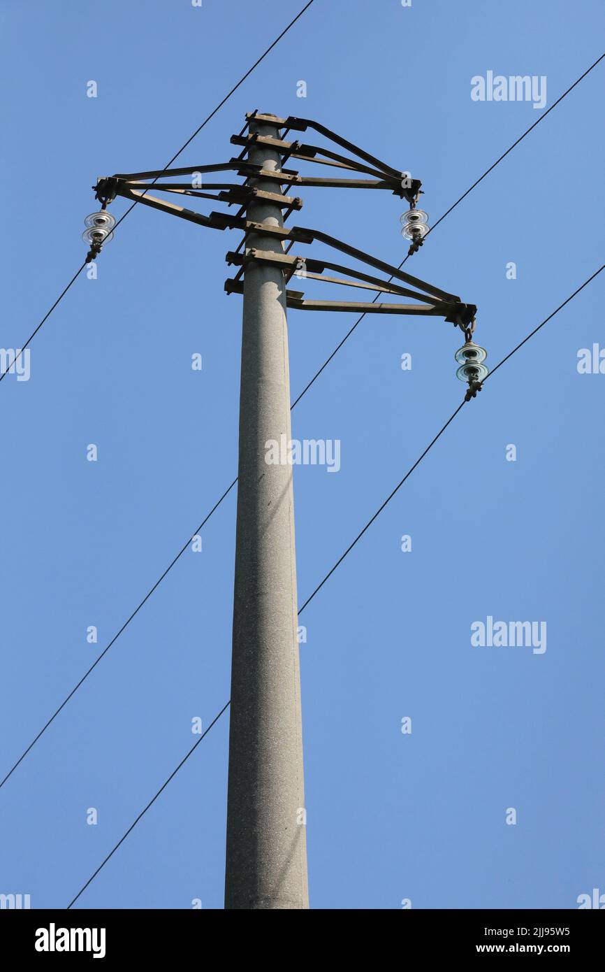 reinforced concrete pole with the supports and insulators of the high ...