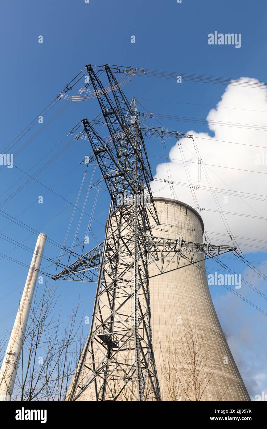 A vertical shot of An atomic station at work and an electric pole Stock ...