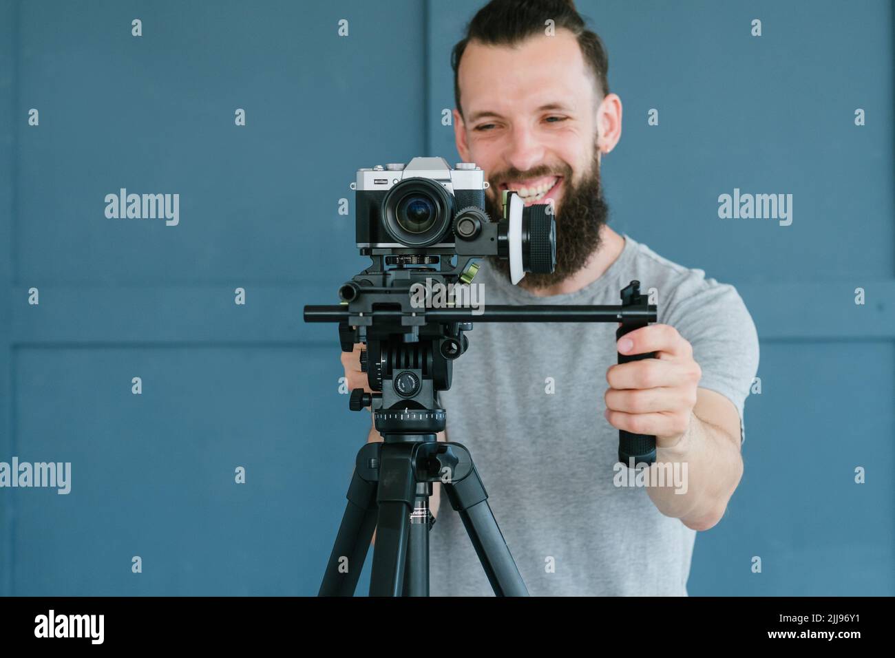 cameraman lifestyle man shoot video equipment Stock Photo - Alamy