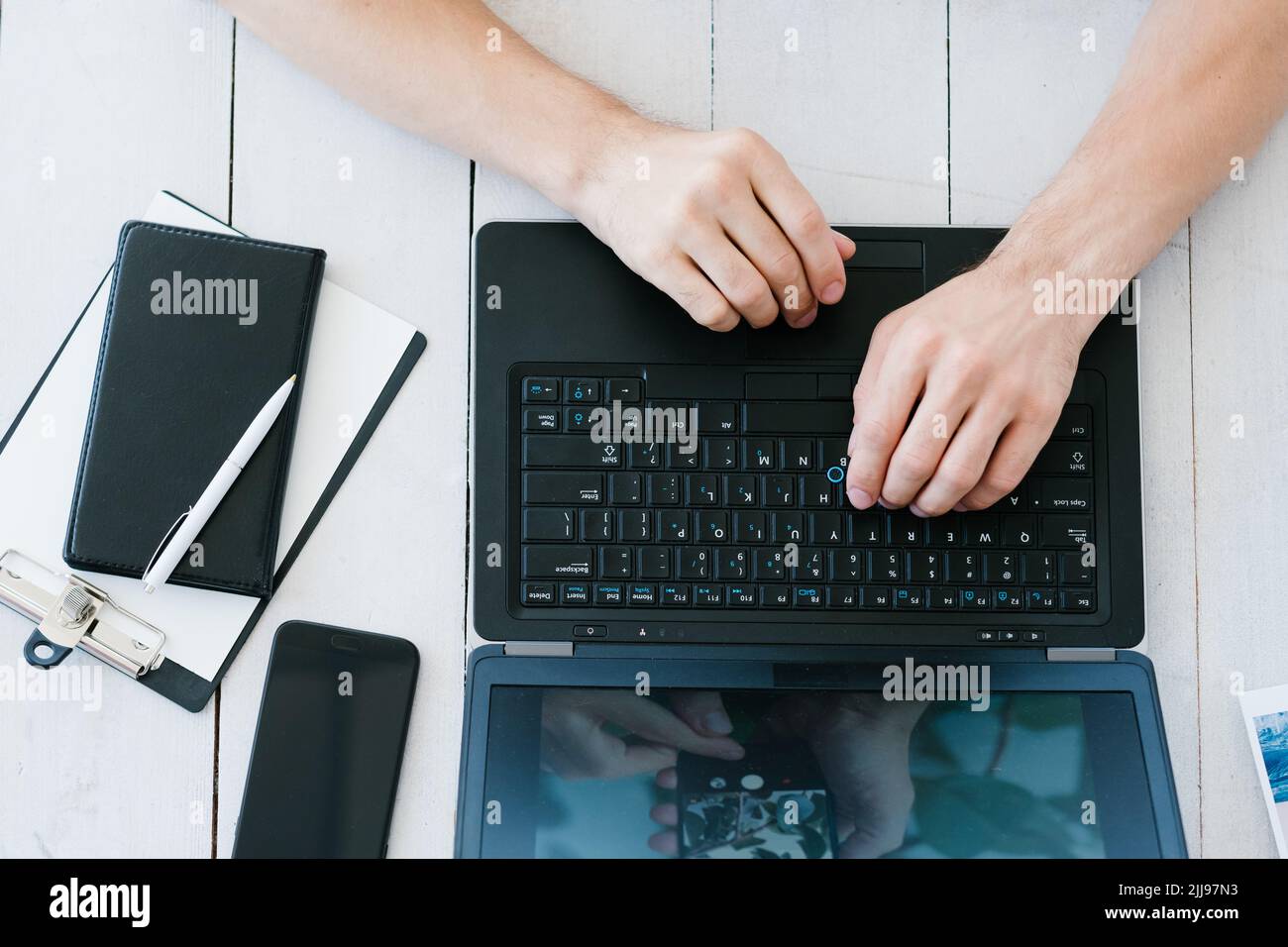 freelance work remote job laptop man hand keyboard Stock Photo - Alamy