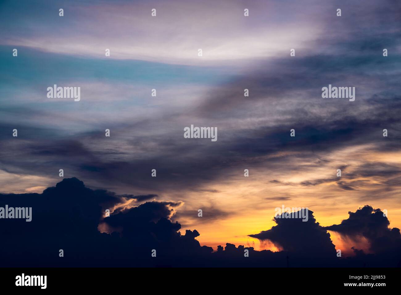 nature orange sunset sky with cloud in rain season abstract background ...