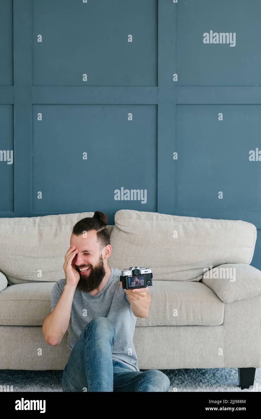 content creation blog laughing man video camera Stock Photo - Alamy
