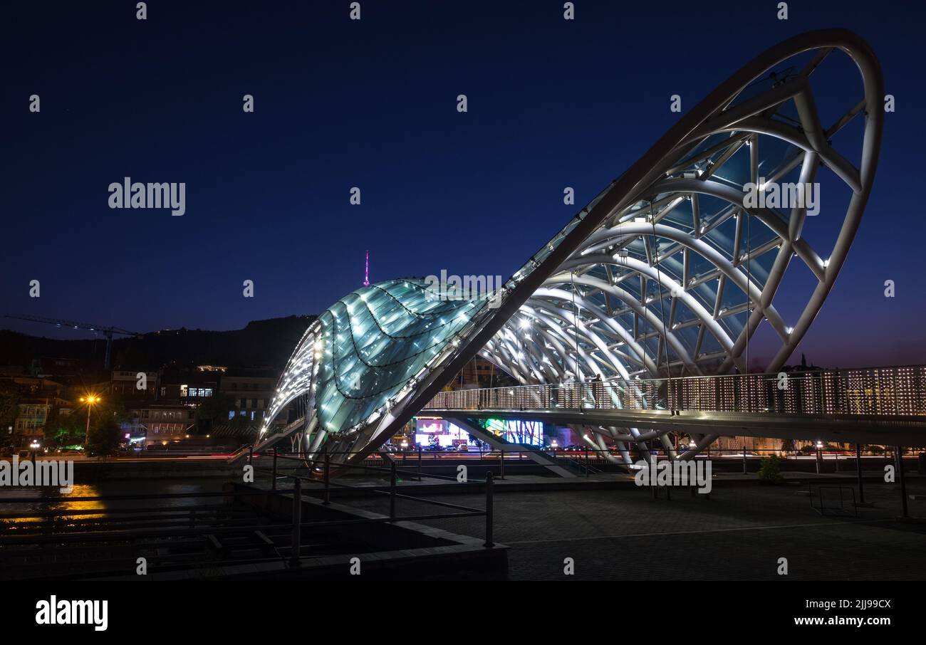Bridge of Peace bow-shaped pedestrian bridge in Old Tbilisi town the ...