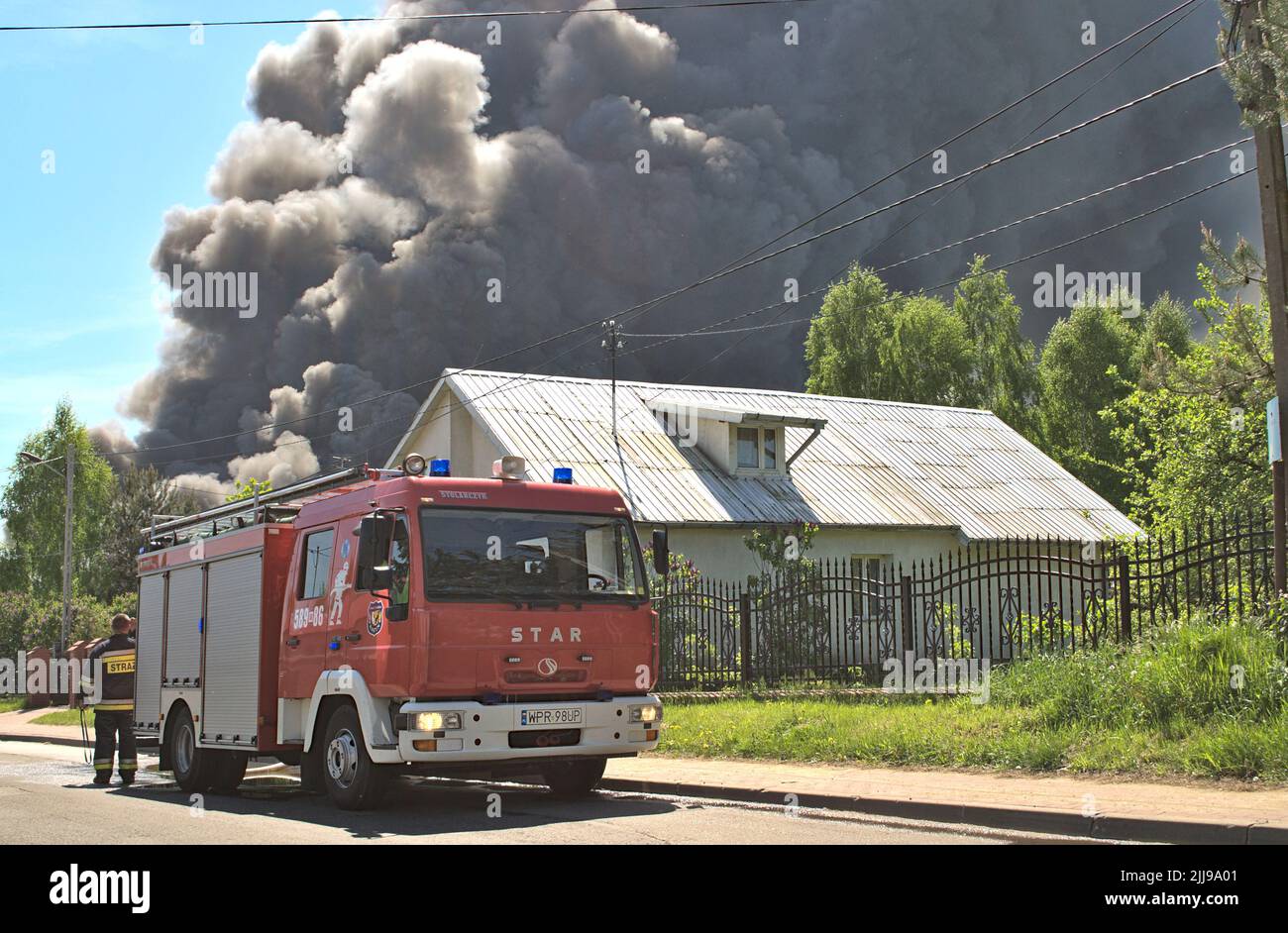 Dark smoke rising from house hi-res stock photography and images - Alamy