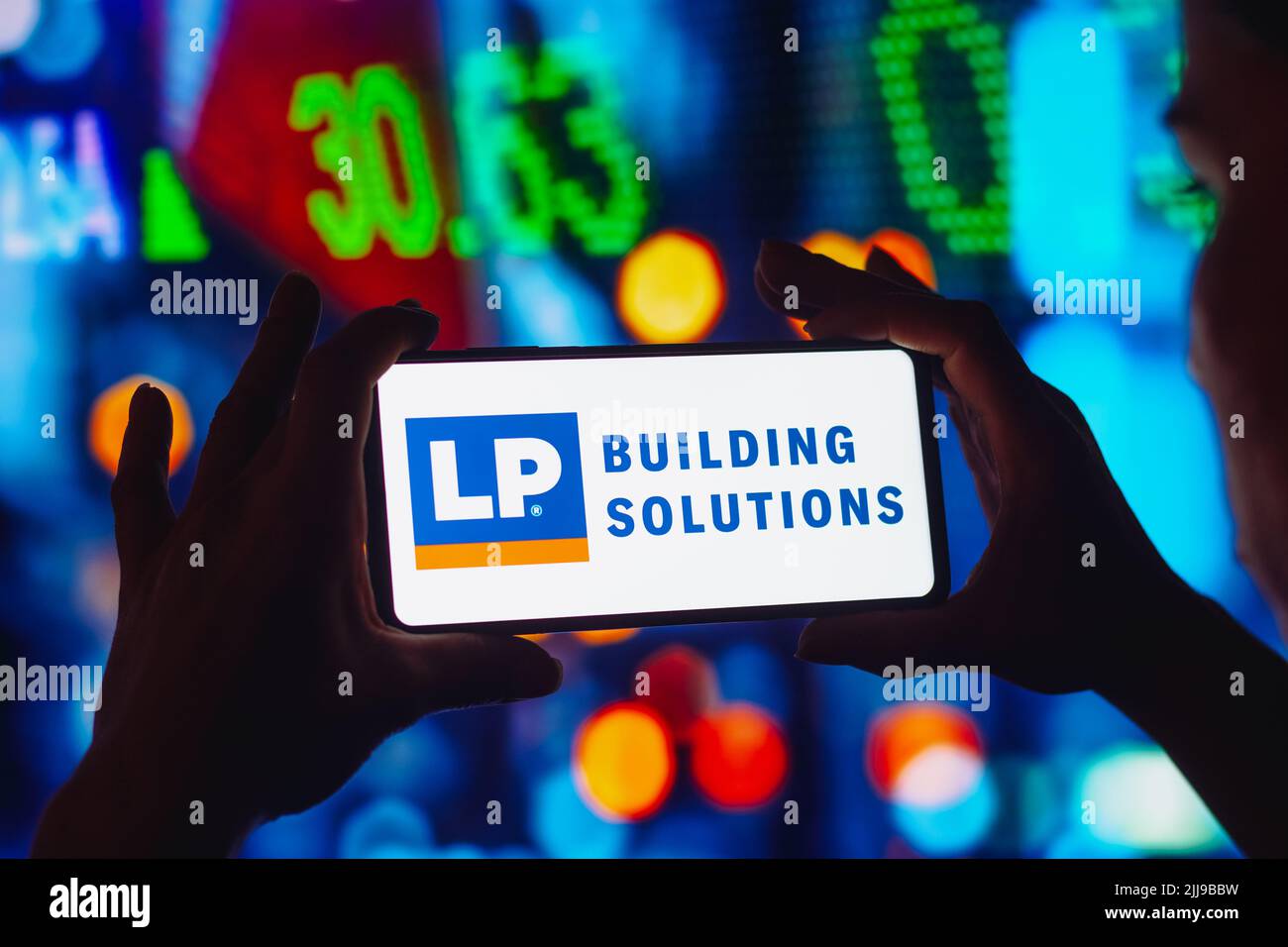 In this photo illustration, the Louisiana-Pacific Corporation (LP) logo is displayed on a ...