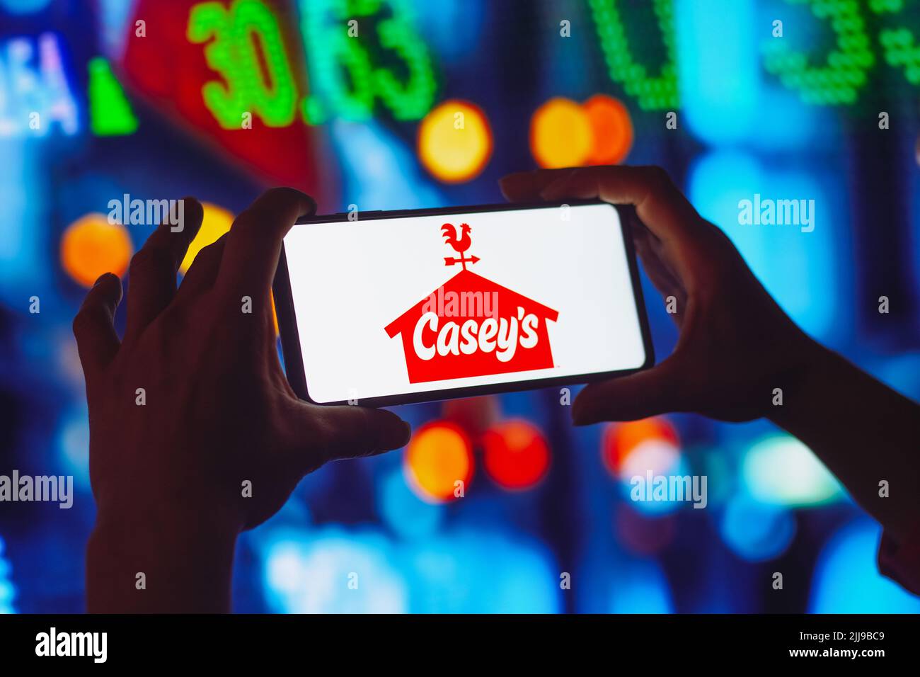 In this photo illustration, the Casey's Retail Company logo is ...