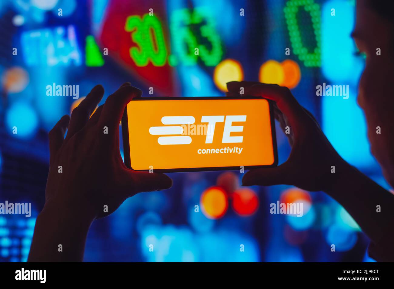 In this photo illustration, the TE Connectivity logo is displayed on a ...