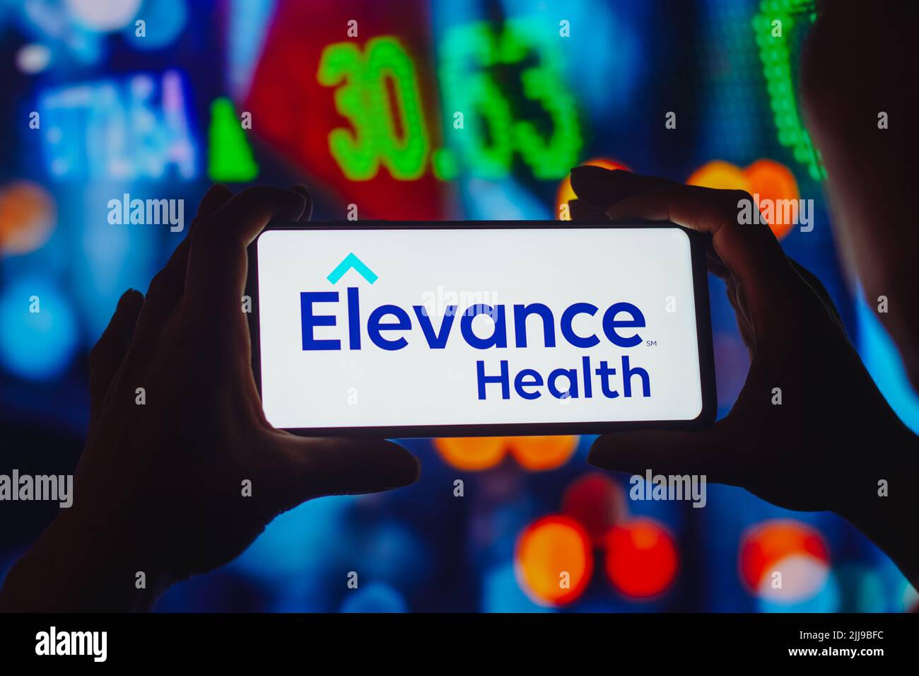 In this photo illustration, the Elevance Health logo is displayed on a smartphone screen Stock ...