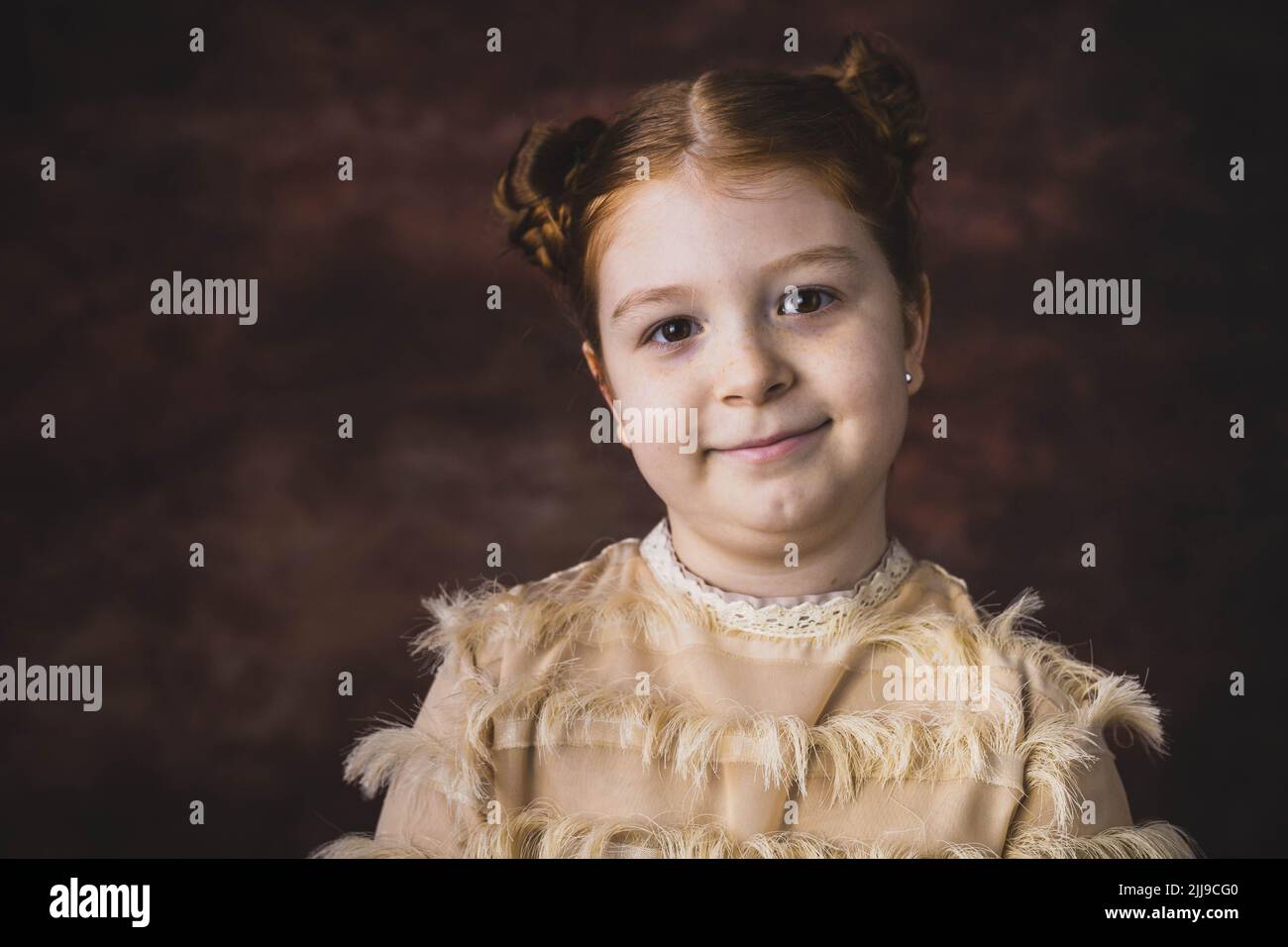 Portrait of a little red hair girl with piggy tails Stock Photo - Alamy