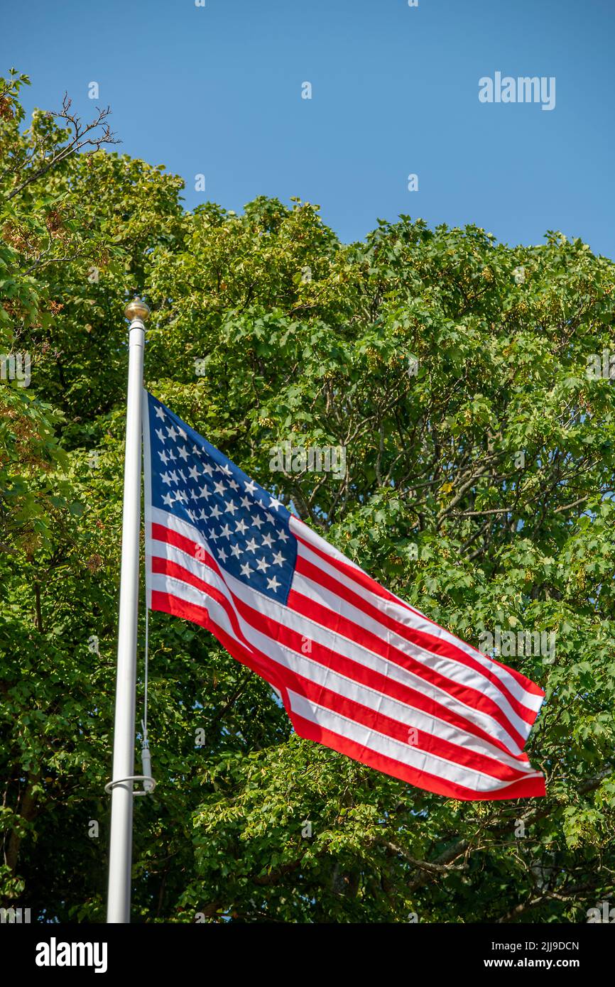 American flag wavering in wind hi-res stock photography and images - Alamy