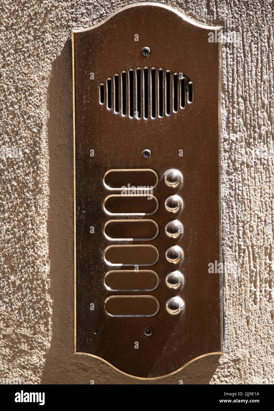 Weathered Brass Panel With Six Doorbells And Speaker Stock Photo - Alamy