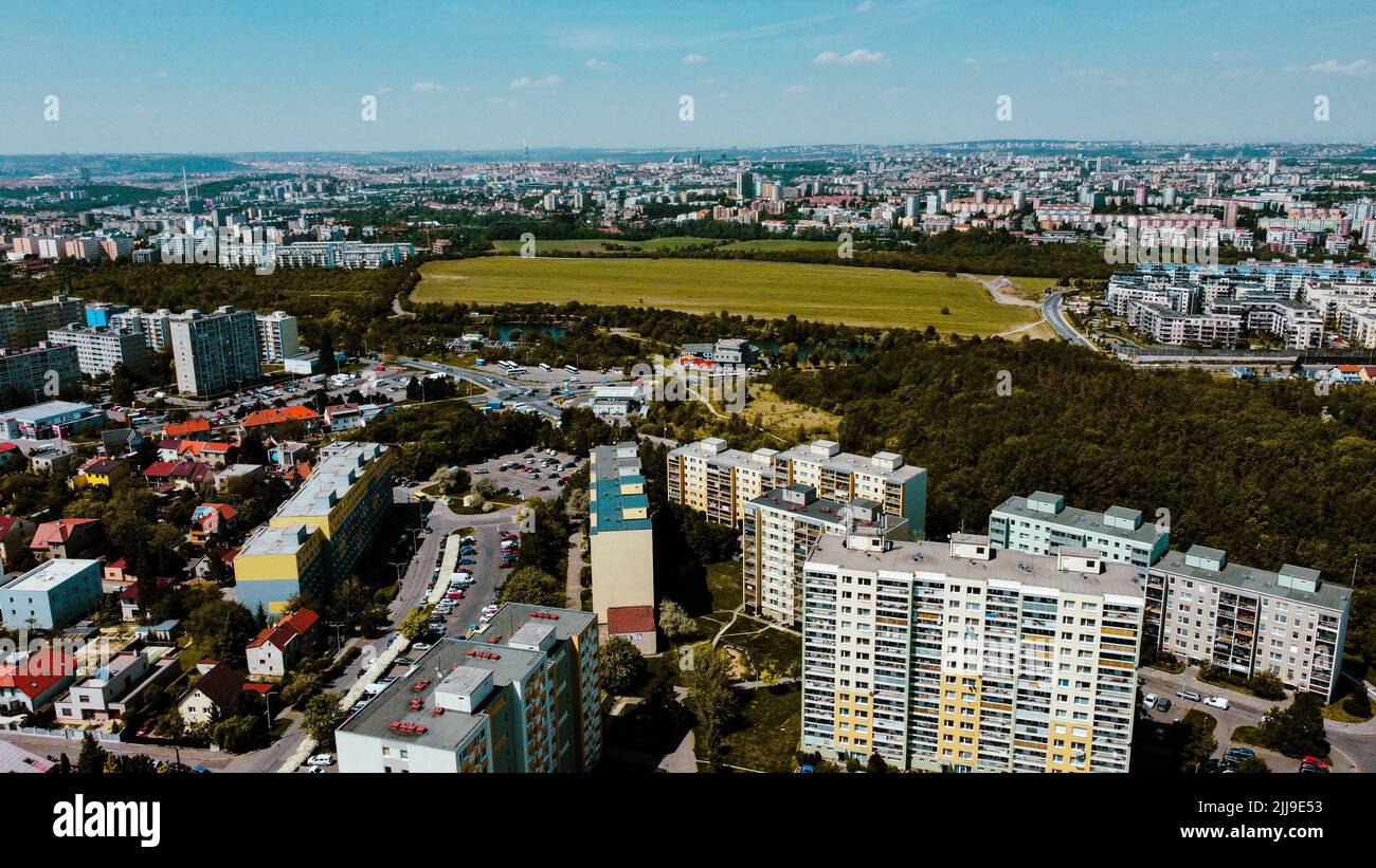 An aerial view of high-rise apartments and office buildings in suburbs ...