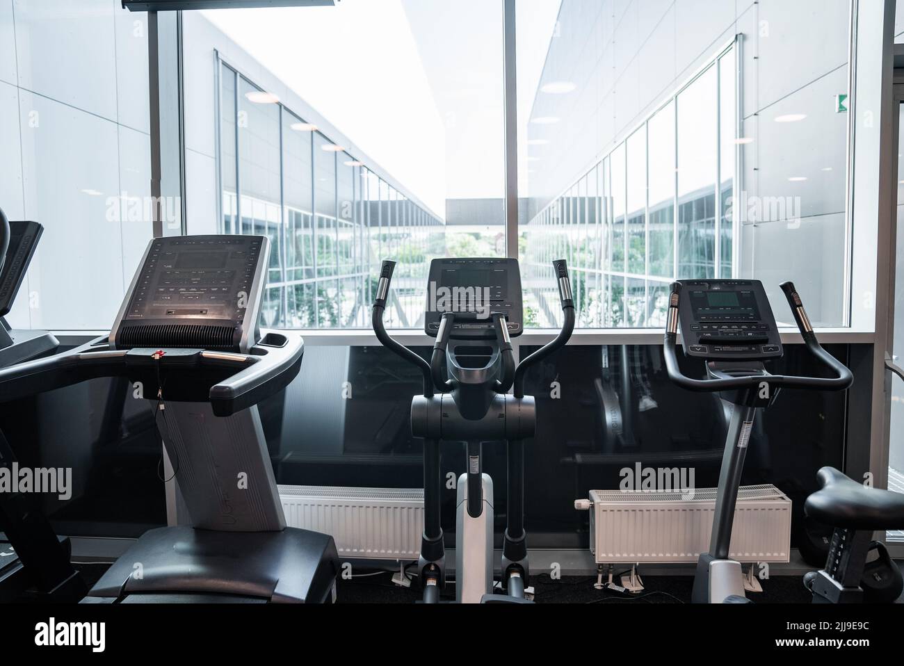 Modern light gym. Sports equipment in gym Stock Photo - Alamy