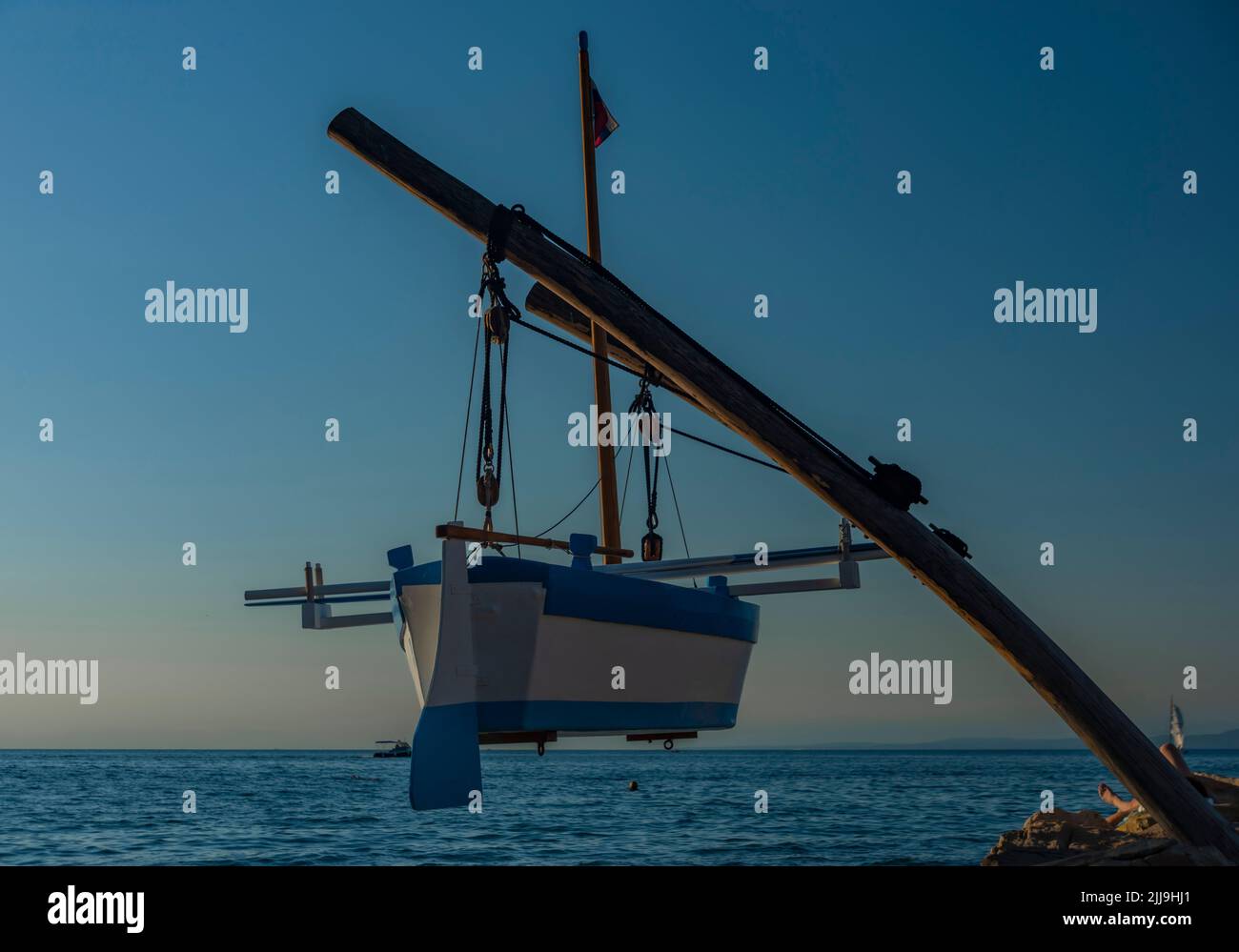 Boat over Jadran sea in Izola town in hot middle summer blue sky fresh ...
