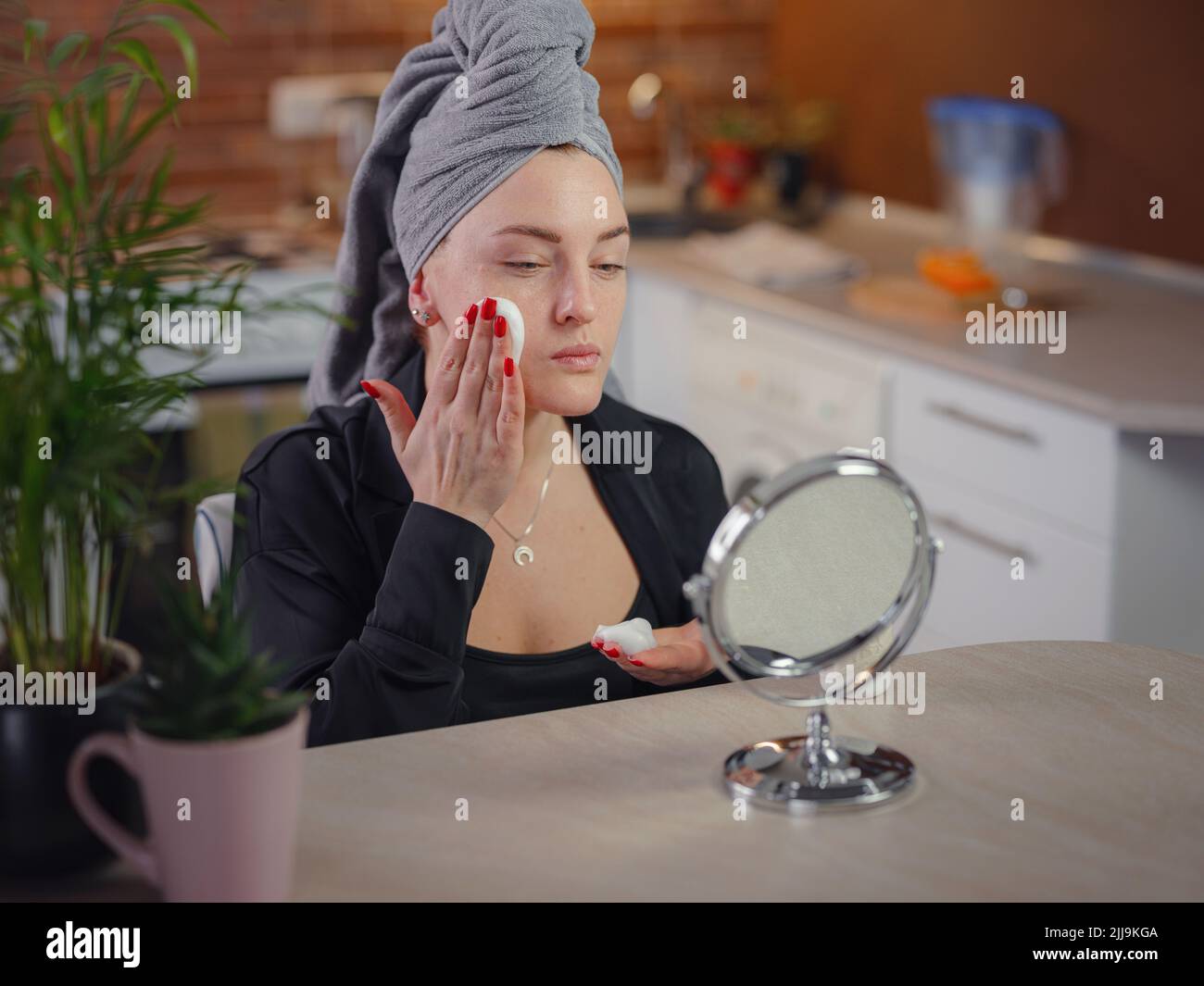 Enjoying flawless skin . Peaceful lady being satisfied with condition ...