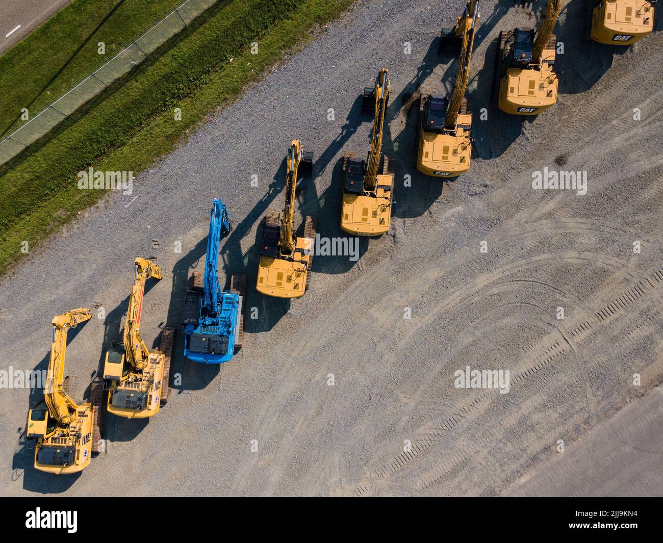 An aerial view of a row of excavators Stock Photo - Alamy