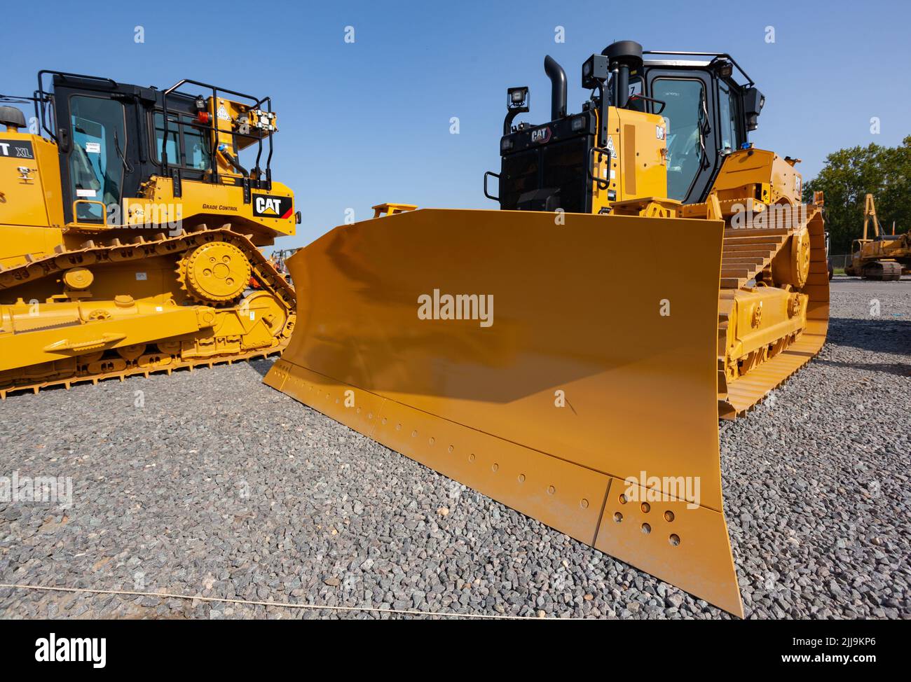A big yellow blade of a Caterpillar bulldozer Stock Photo - Alamy
