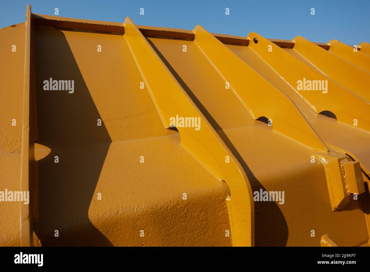 A closeup of the backside of the blade of a bulldozer Stock Photo - Alamy
