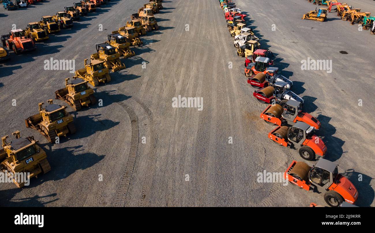 An aerial view of rows of bulldozers and steam rollers Stock Photo - Alamy
