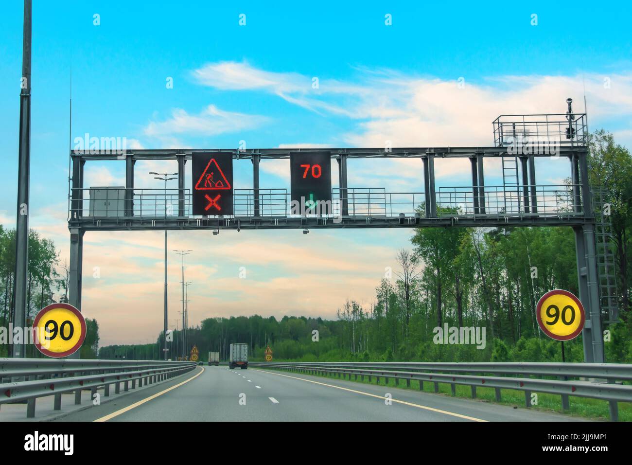 Road with luminous designation banner sign on the road road repair and ...