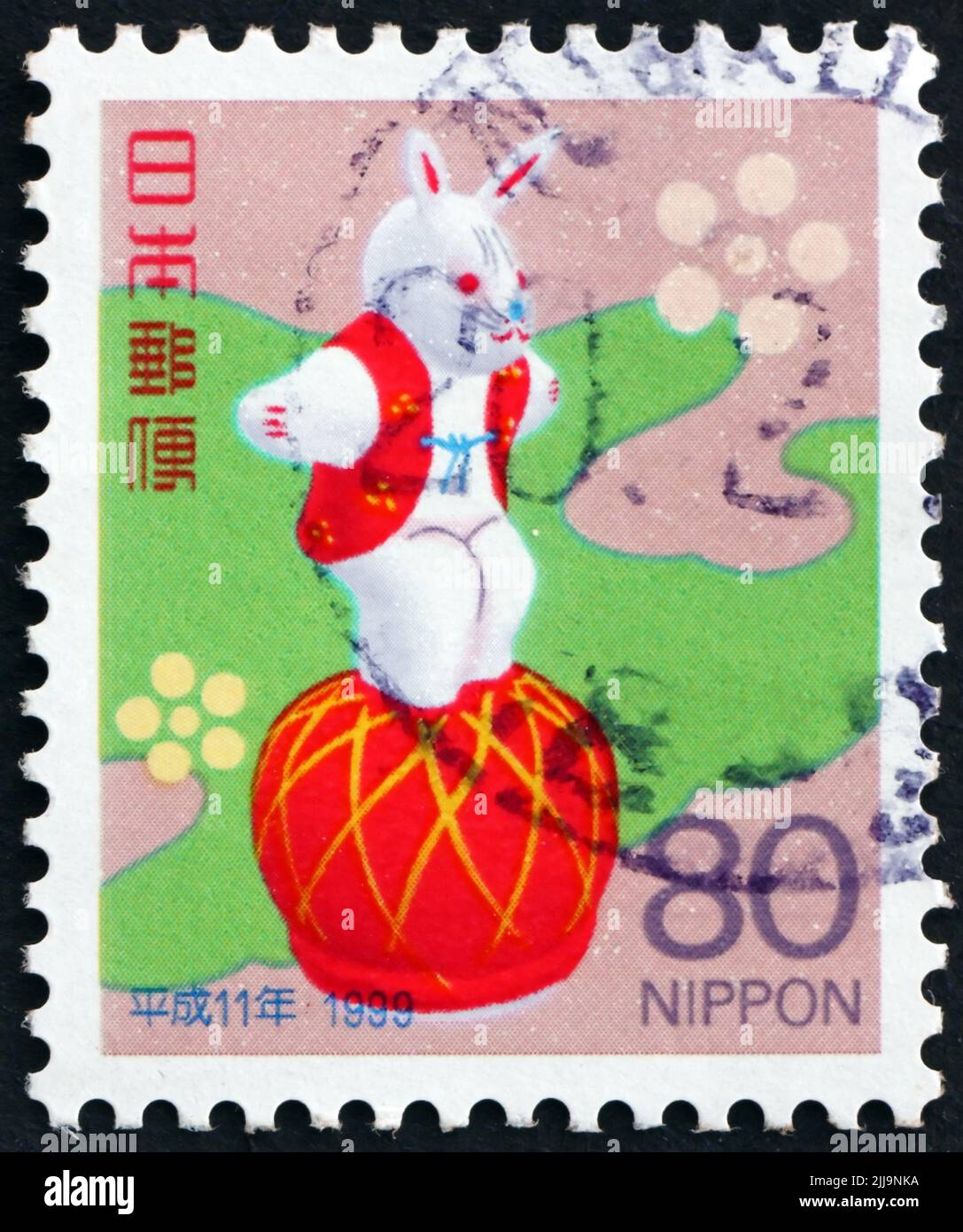 JAPAN - CIRCA 1999: a stamp printed in Japan shows rabbit on a ball ...